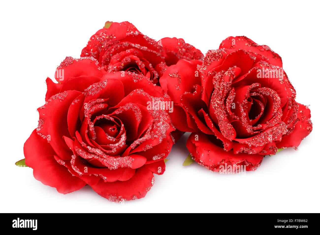 Red fabric roses isolated on white background Stock Photo - Alamy