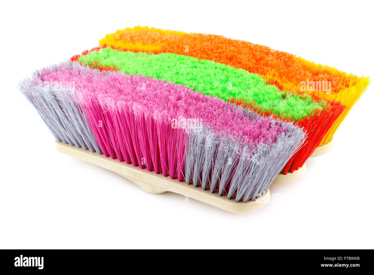 Colorful brooms isolated on white background Stock Photo - Alamy