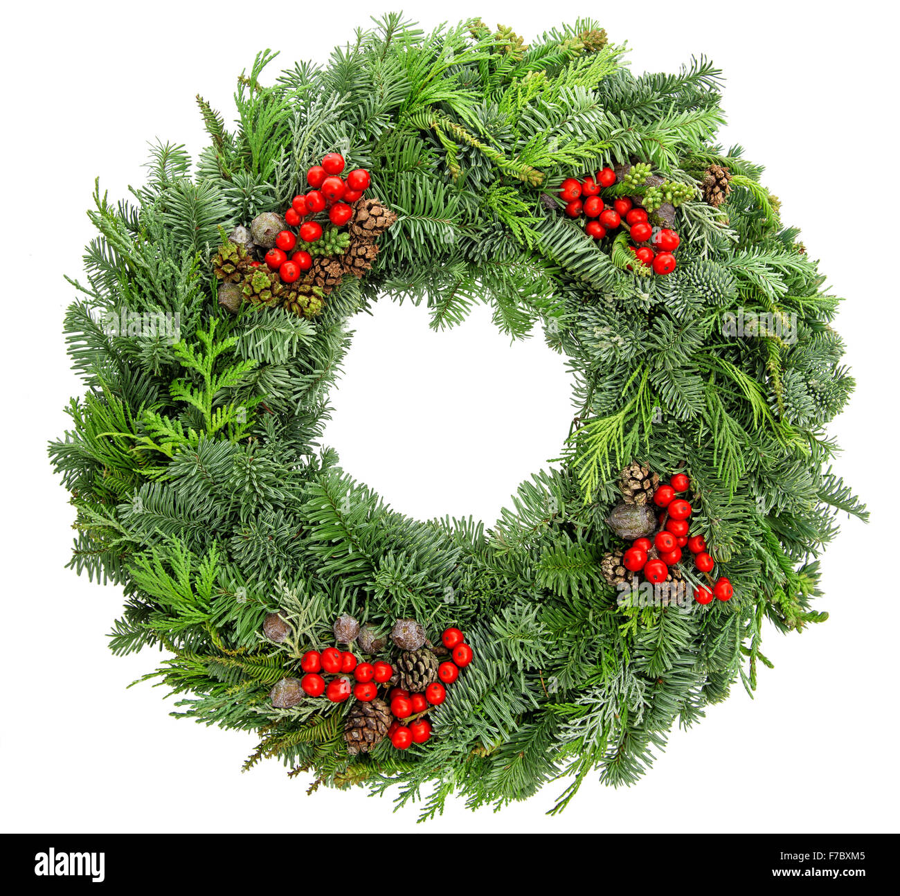 Christmas wreath from fir, pine, spruce twigs with cones and red ...