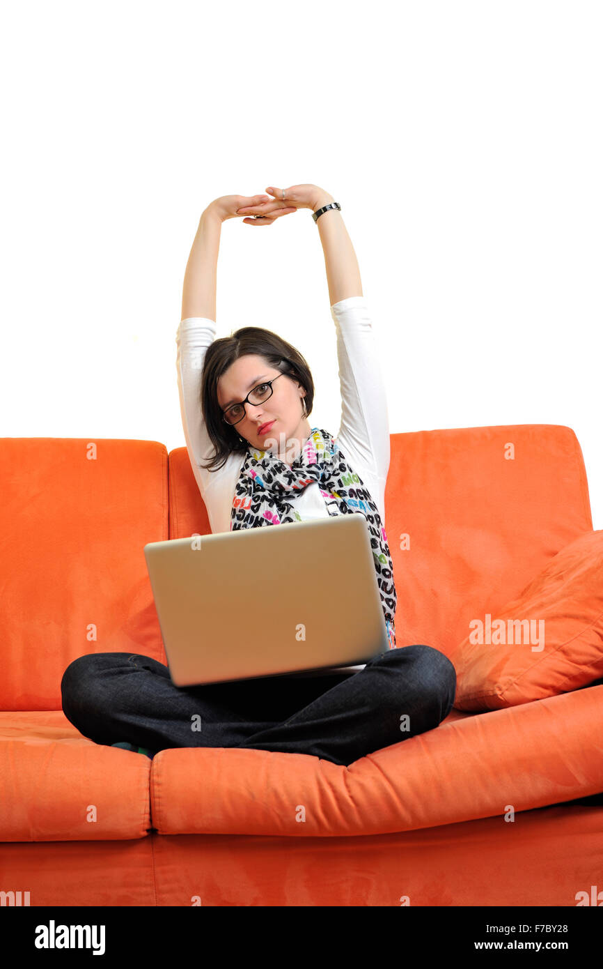 Woman at home, on sofa with laptop computer Stock Photo - Alamy