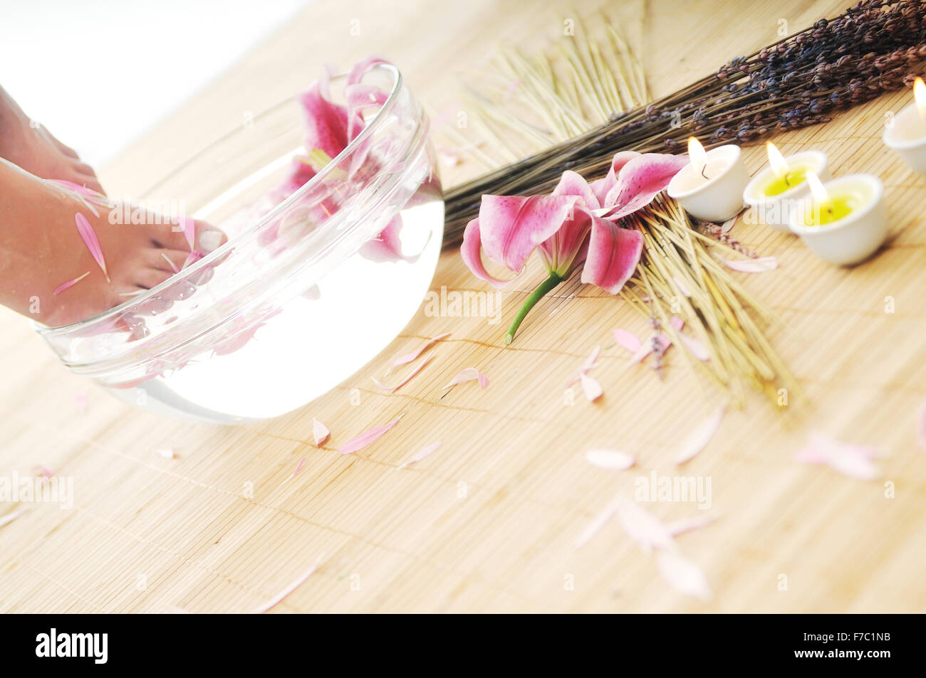 woman spa pedicure foot treatment with water and flower Stock Photo - Alamy