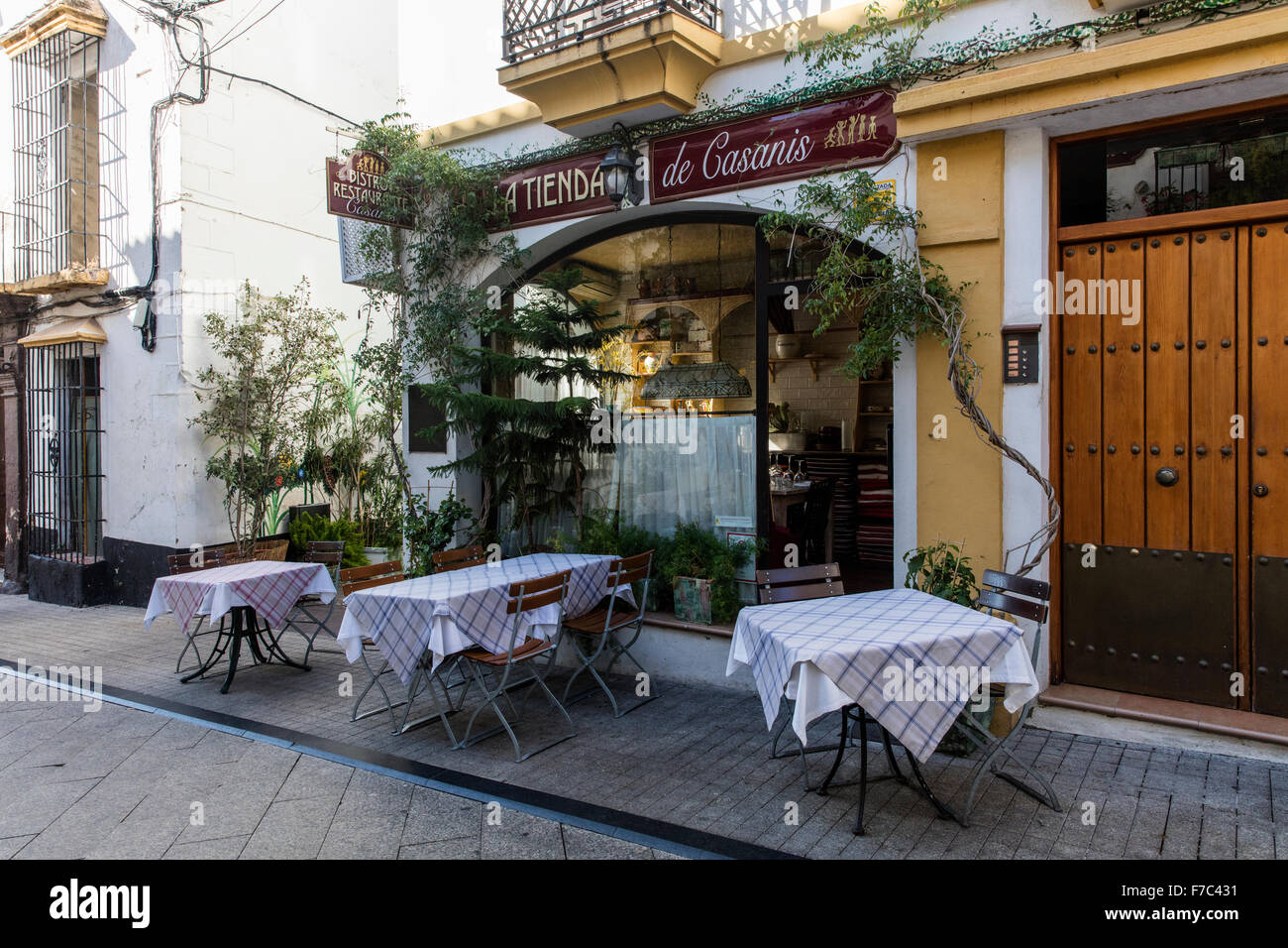 Trendy looking beautiful stylish restaurant with three outside tables ...