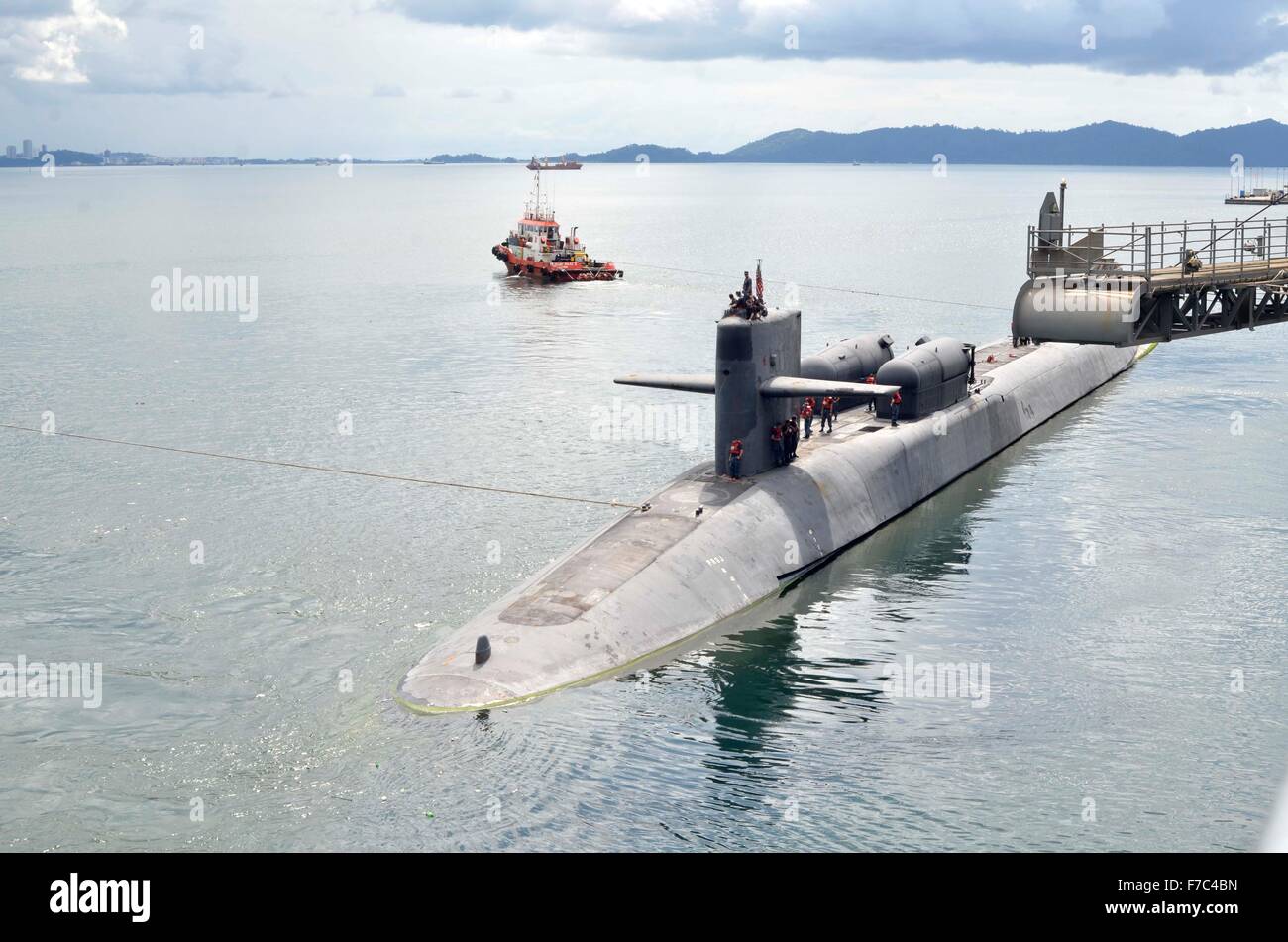 The U.S. Navy guided missile submarine USS Ohio gets underway after ...