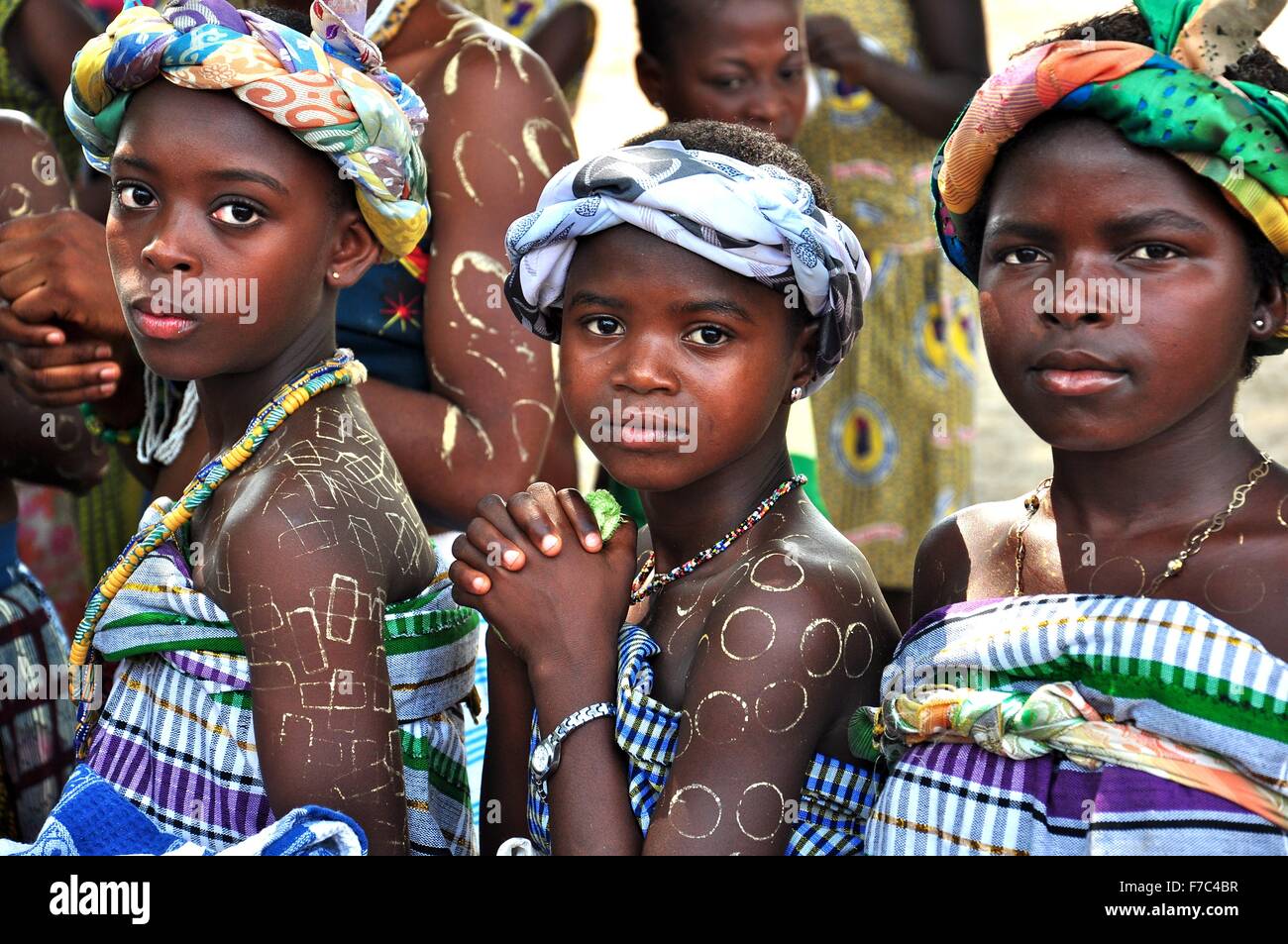 Young Ghanian women during a traditional dance at a community outreach ...