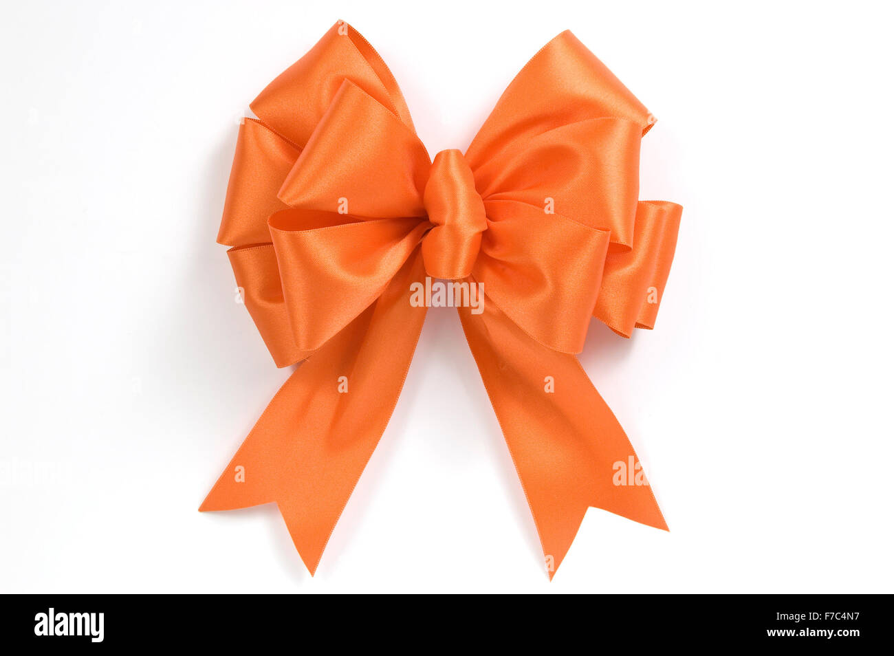 Vibrant Orange Bow Stock Photo - Alamy