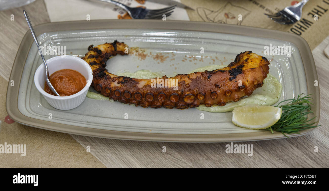 Grilled octopus at a seafood restaurant in Bangkok, Thailand Stock ...