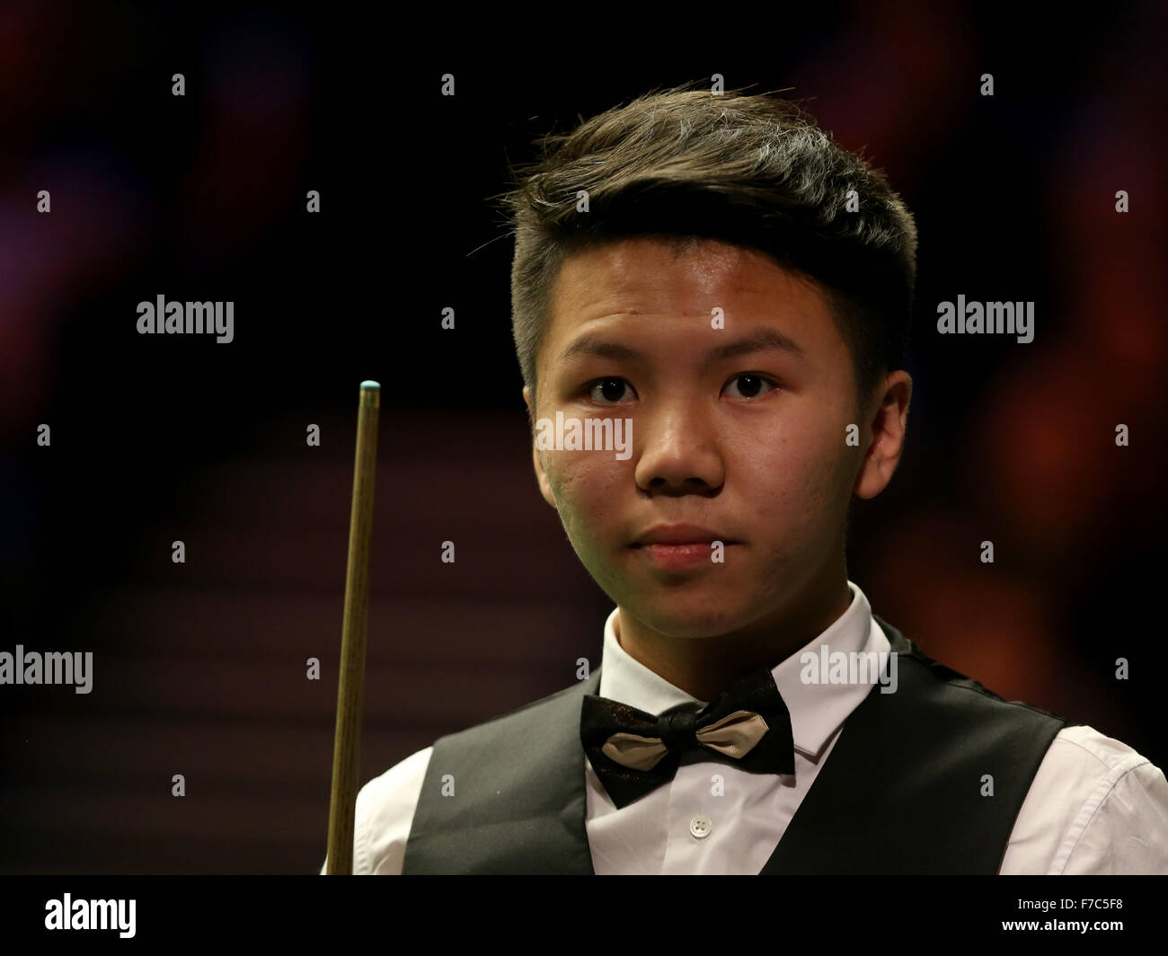 York. 28th Nov, 2015. Zhou Yuelong of China reacts during his second ...