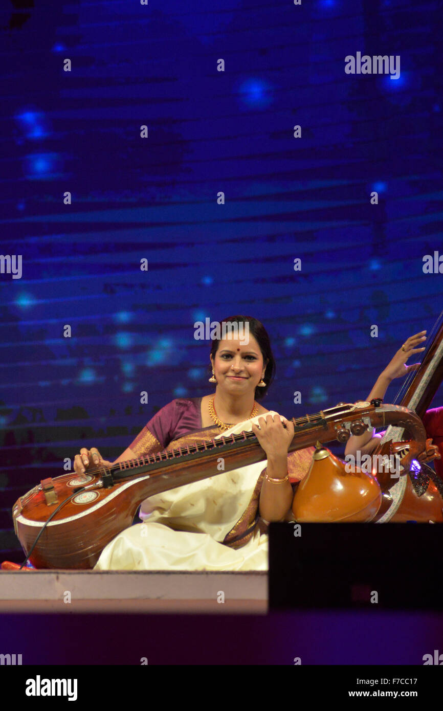 Woman playing veena music instrument hi-res stock photography and ...