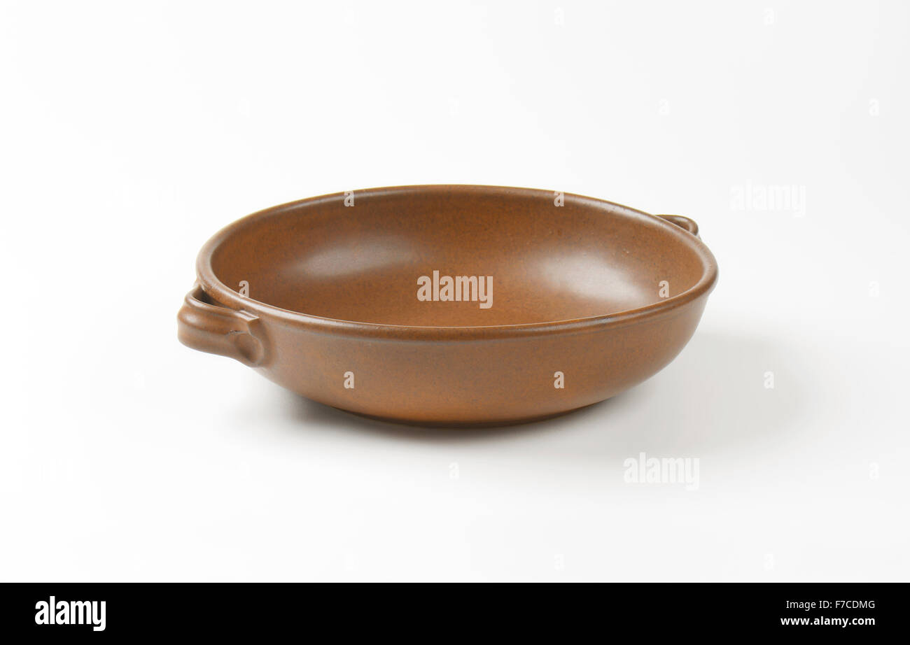 Brown round dish hi-res stock photography and images - Alamy