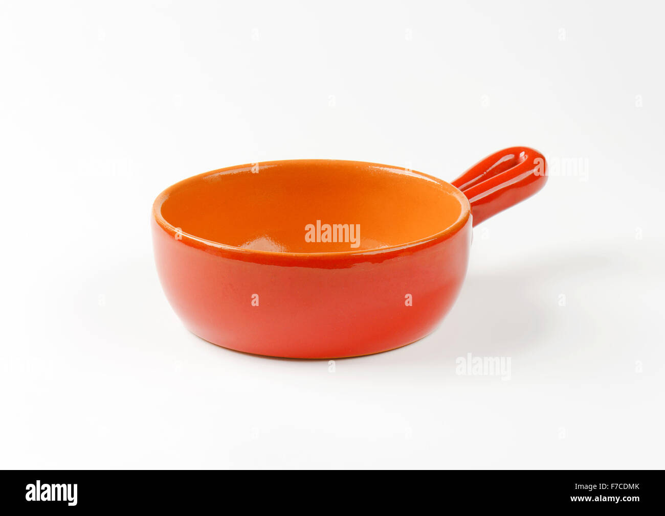 Empty glazed terracotta sauce pan Stock Photo - Alamy