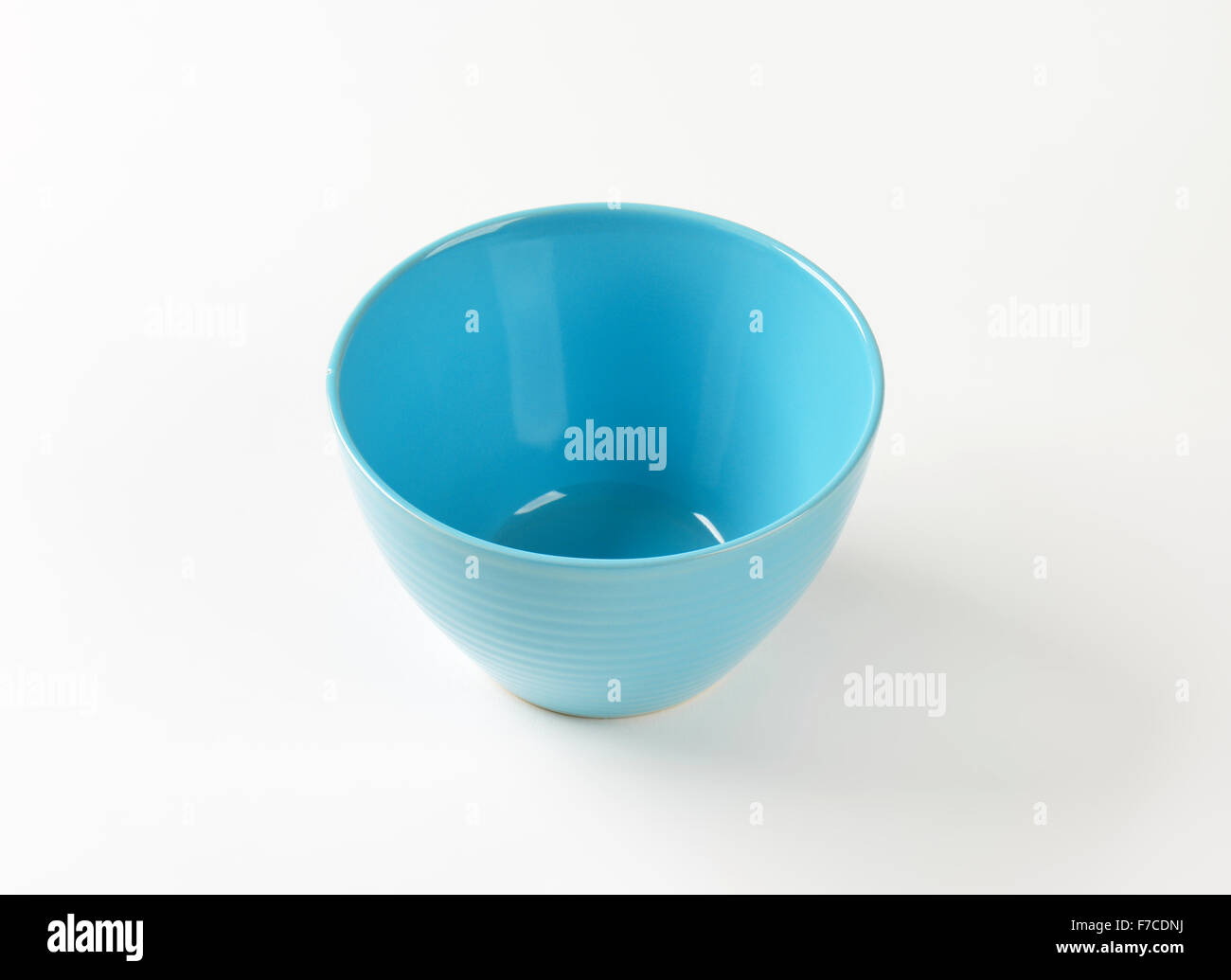 Empty deep blue snack bowl Stock Photo - Alamy