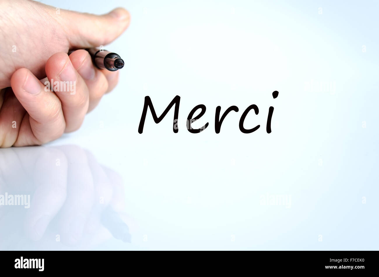 Merci text concept isolated over white background Stock Photo - Alamy