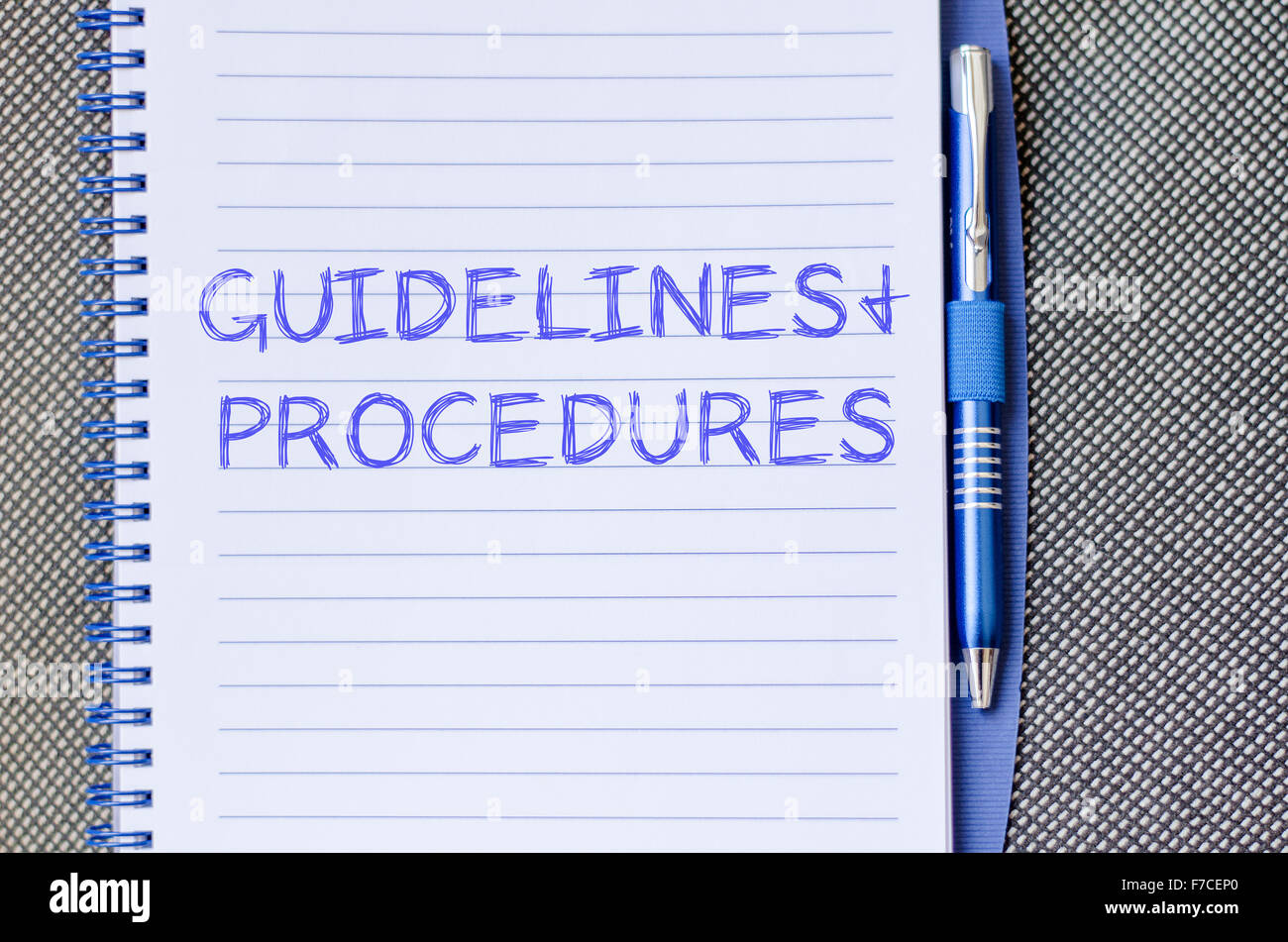 Guidelines and procedures text concept write on notebook with pen Stock ...
