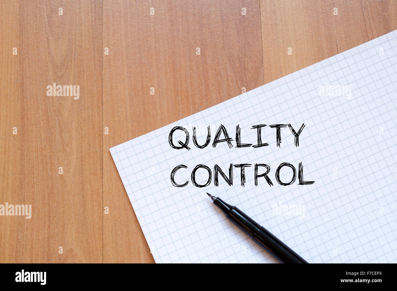 Quality control text concept write on notebook with pen Stock Photo - Alamy