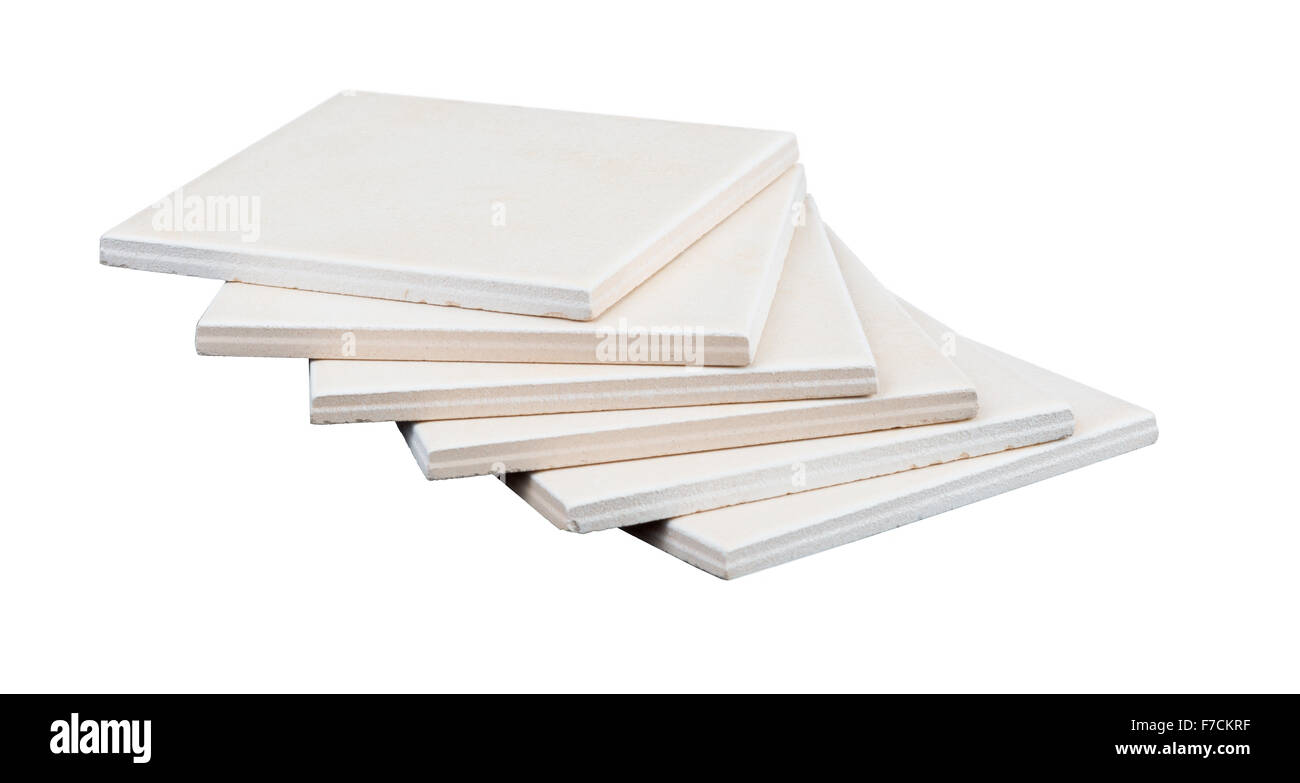 Stack of tiles on white Stock Photo - Alamy