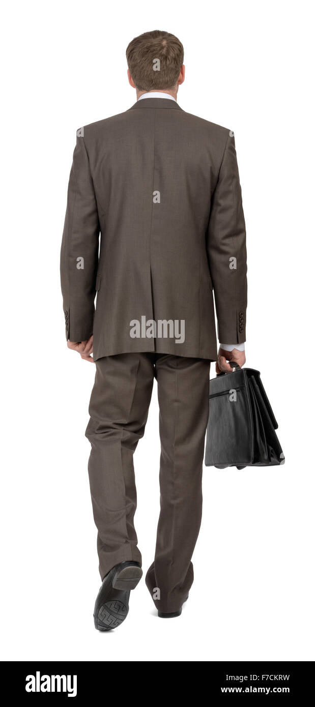 Businessman walking rear view Stock Photo - Alamy