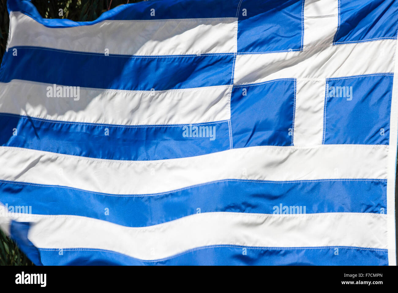 Close up of Greek flag, blue and white, fluttering in the wind. Flag ...