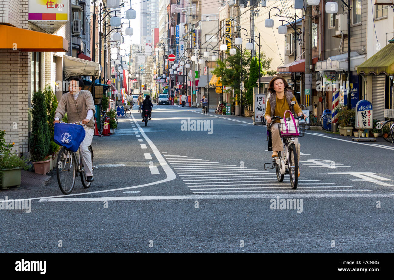 Cycling in the city of Osaka Japan along one of the many cycle paths ...