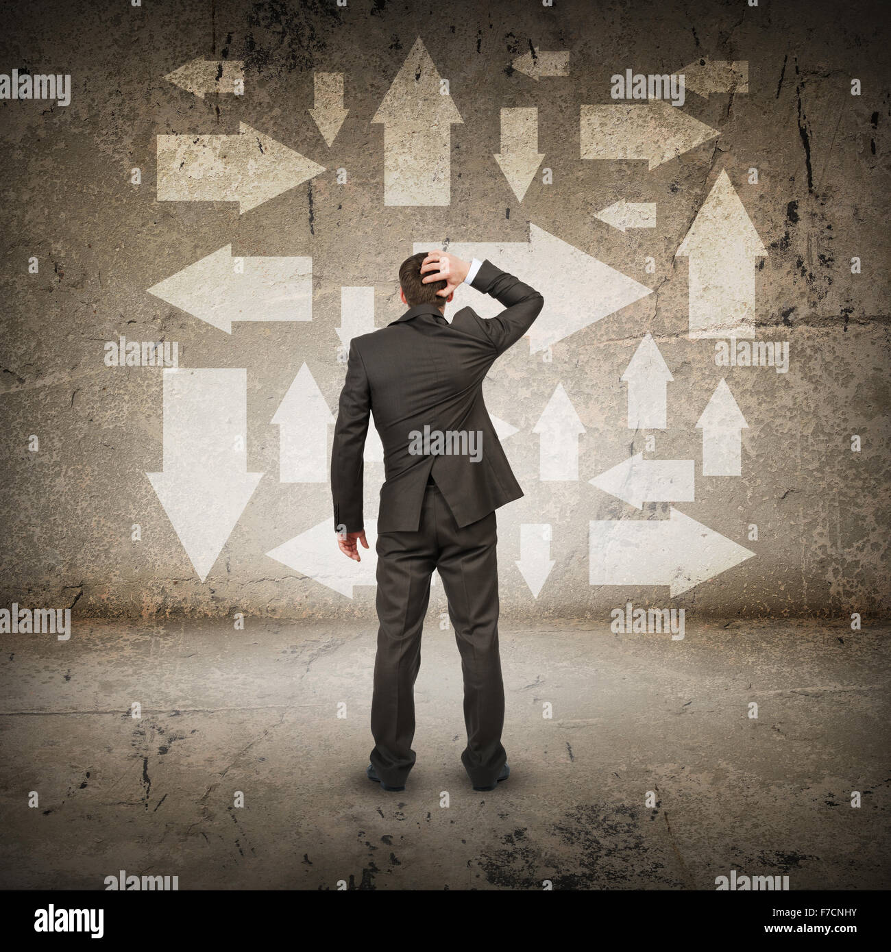 Businessman in front of different ways Stock Photo - Alamy