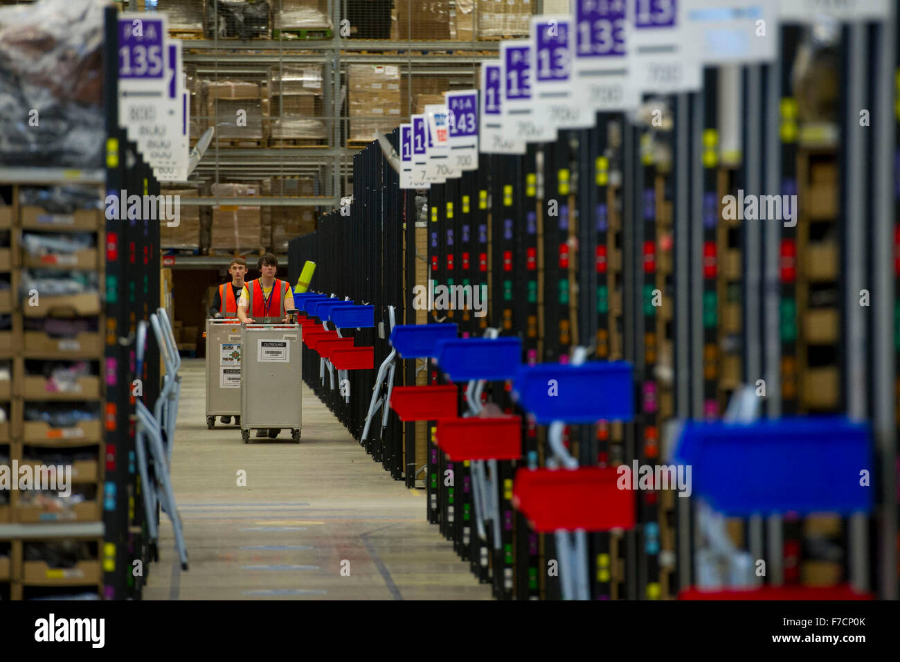 Stock pickers in the Amazon Fulfillment Centre warehouse in Swansea ...