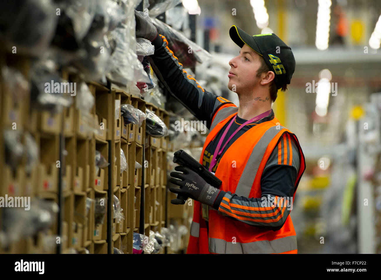 Stock pickers in the Amazon Fulfillment Centre warehouse in Swansea ...