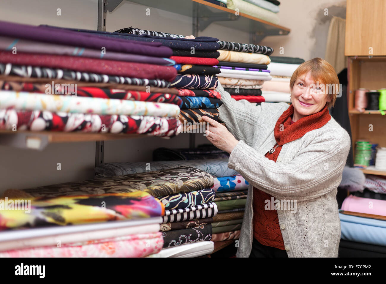 woman chooses tissue at store Stock Photo - Alamy