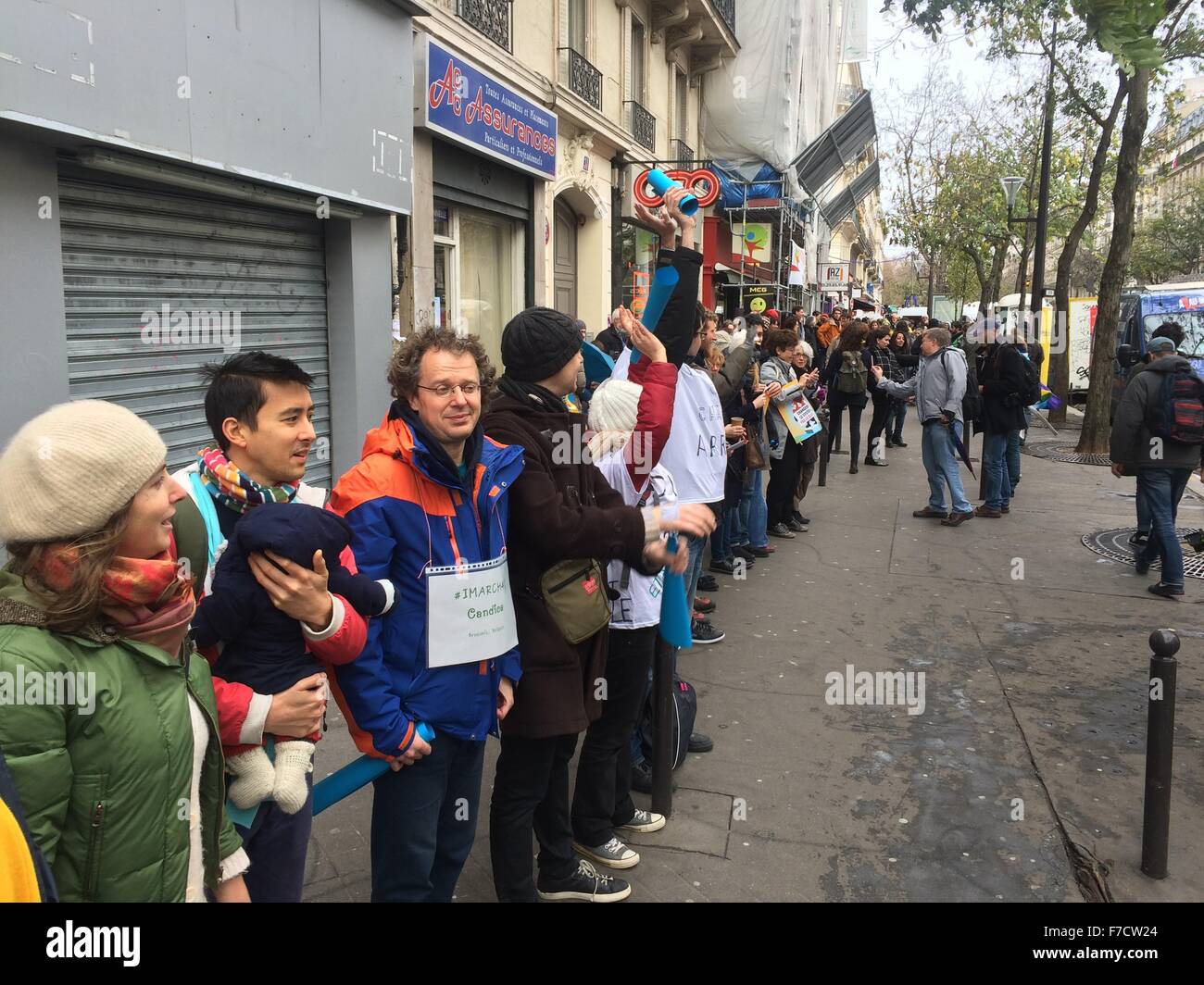 Paris, France. 29th Nov, 2015. Demonstrators form a human chain to ...