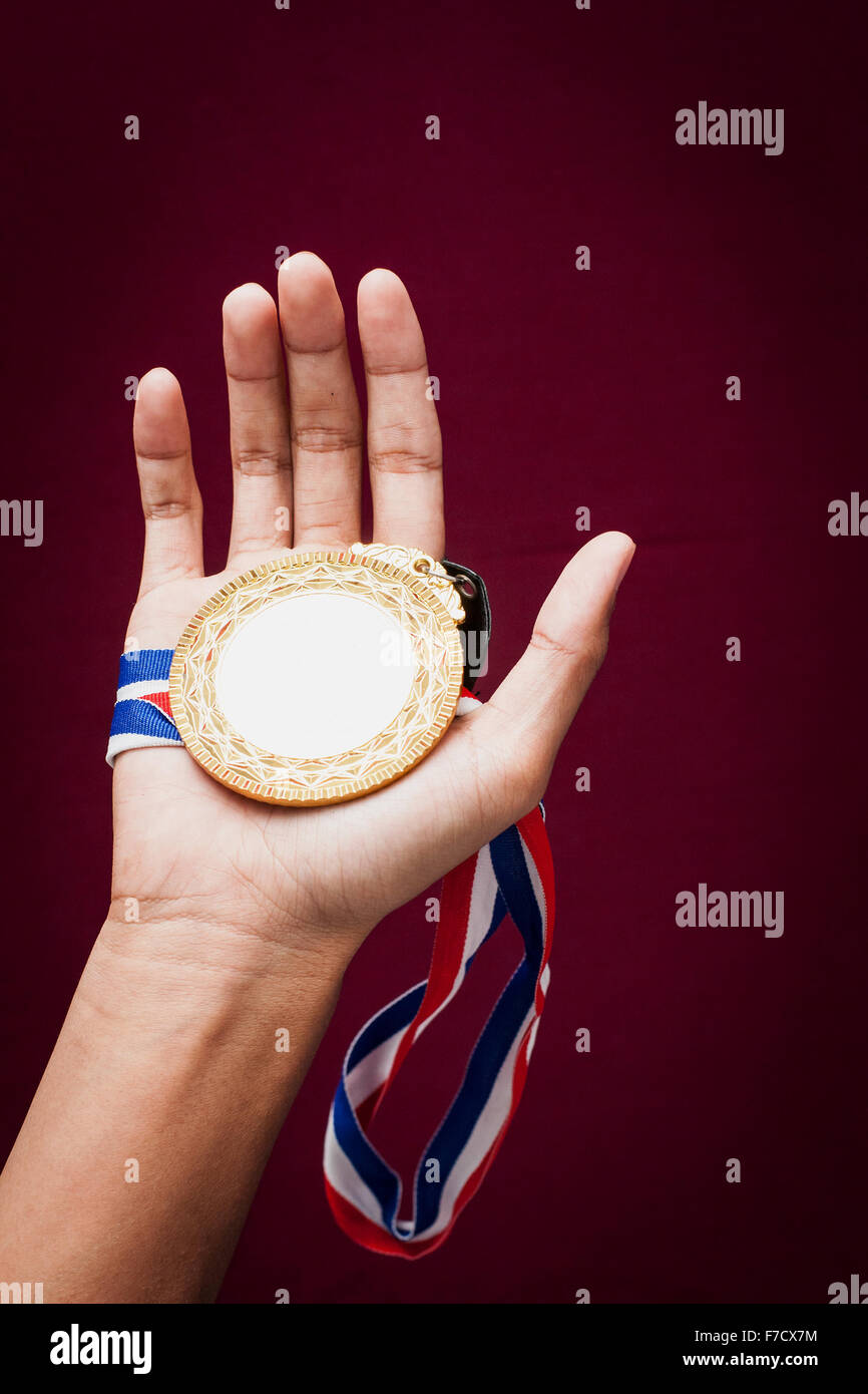 Holding medal hi-res stock photography and images - Alamy