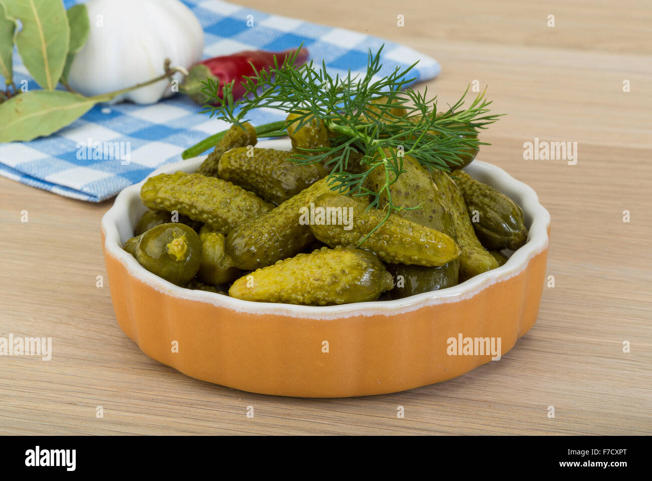 Pickled small cucumber with dill and spices Stock Photo - Alamy
