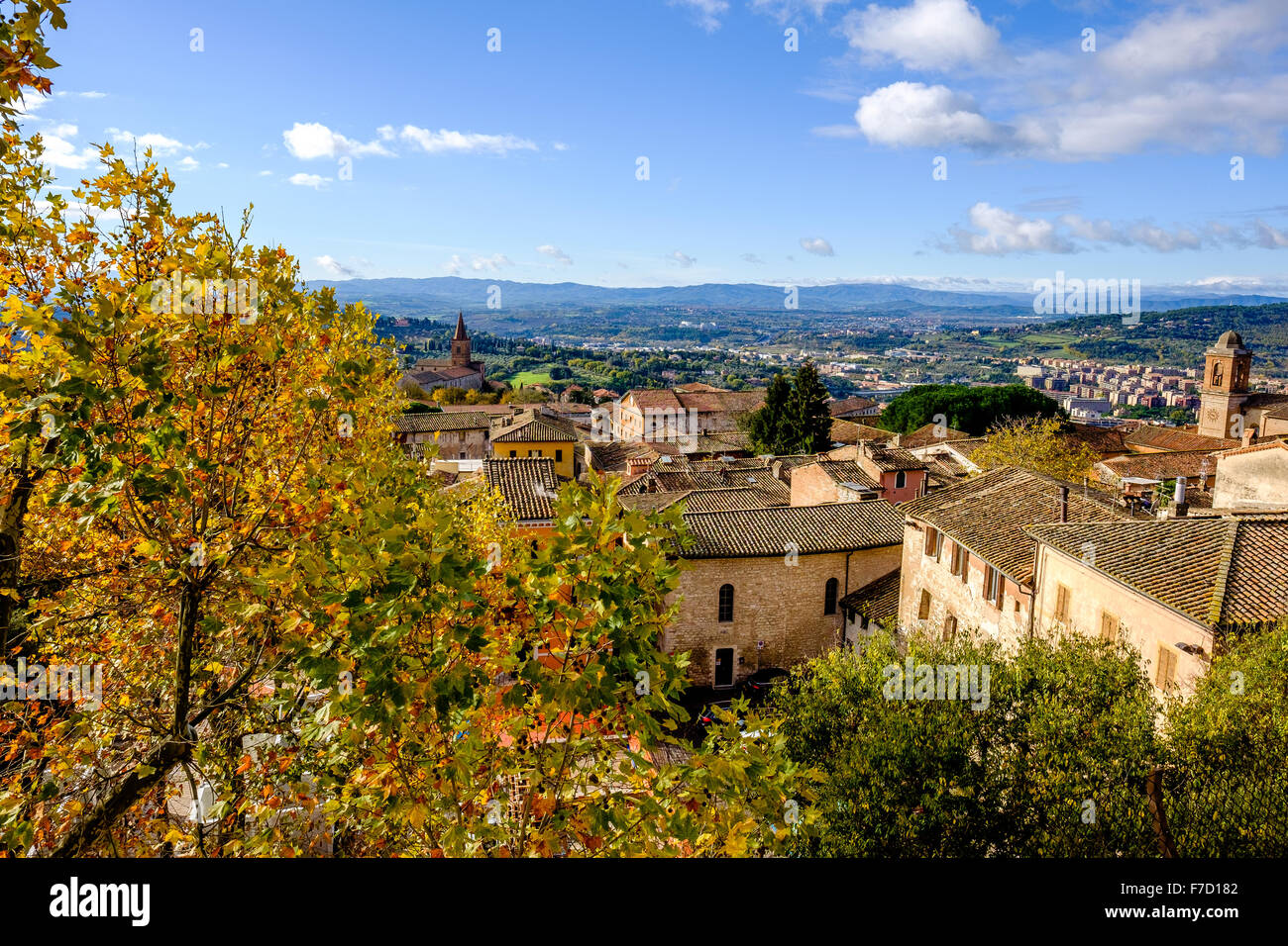 View from Perugia hill top town in Umbria Italy trees in foreground ...