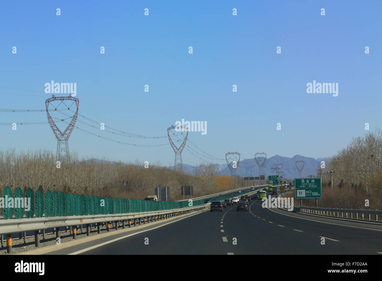 Transmission towers bordering Highway G45 headed from Beijing north ...