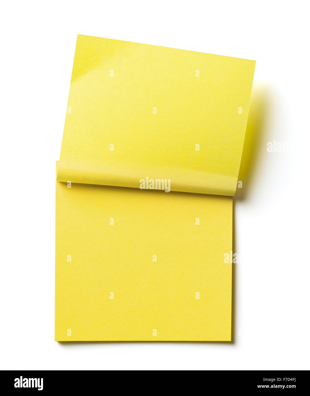 Yellow pieces of paper on white background, isolated Stock Photo - Alamy