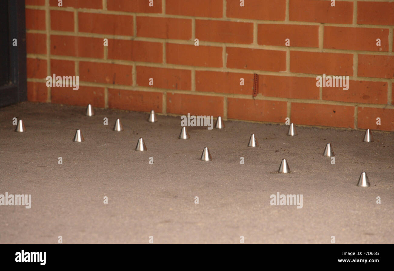 Anti-Homeless spikes installed next to the entrance to a block of ...