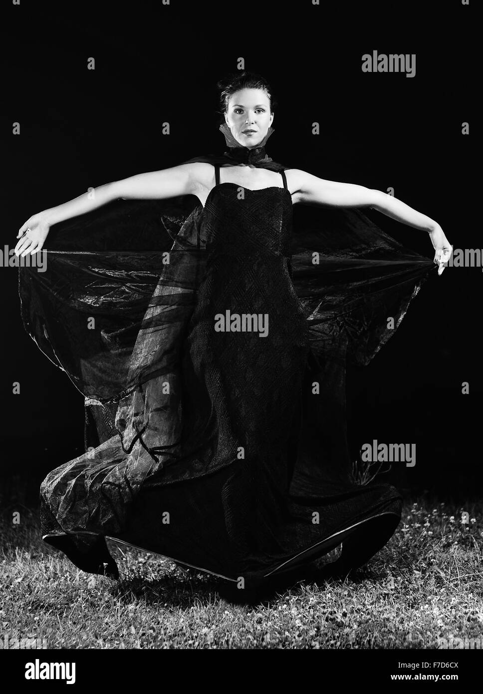 young beautiful bride in black wedding dress in dar at night Stock ...