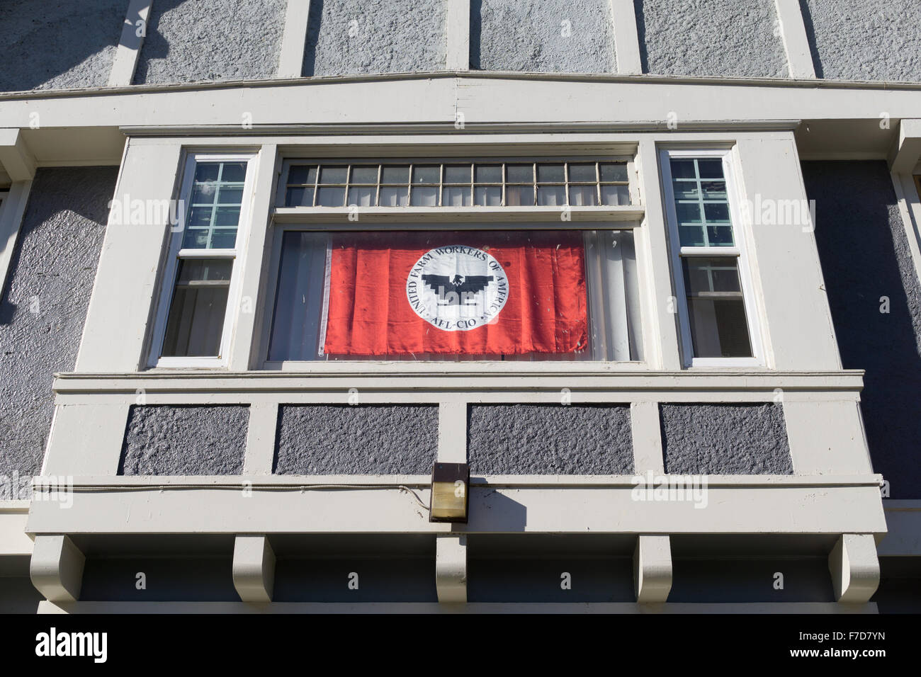 Flag in window Stock Photo - Alamy