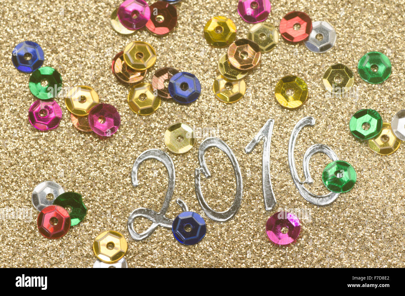 New Year 2016 numbers on golden background Stock Photo - Alamy