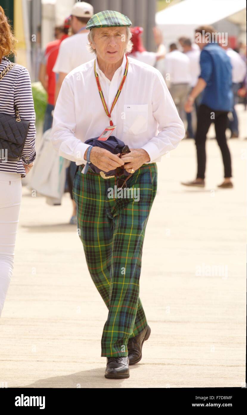 Silverstone circuit, Sir Jackie Stewart walking through the paddock at ...