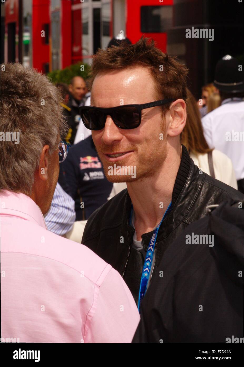 Film star Michael Fassbender shares a joke with Eddie Jordan in the ...