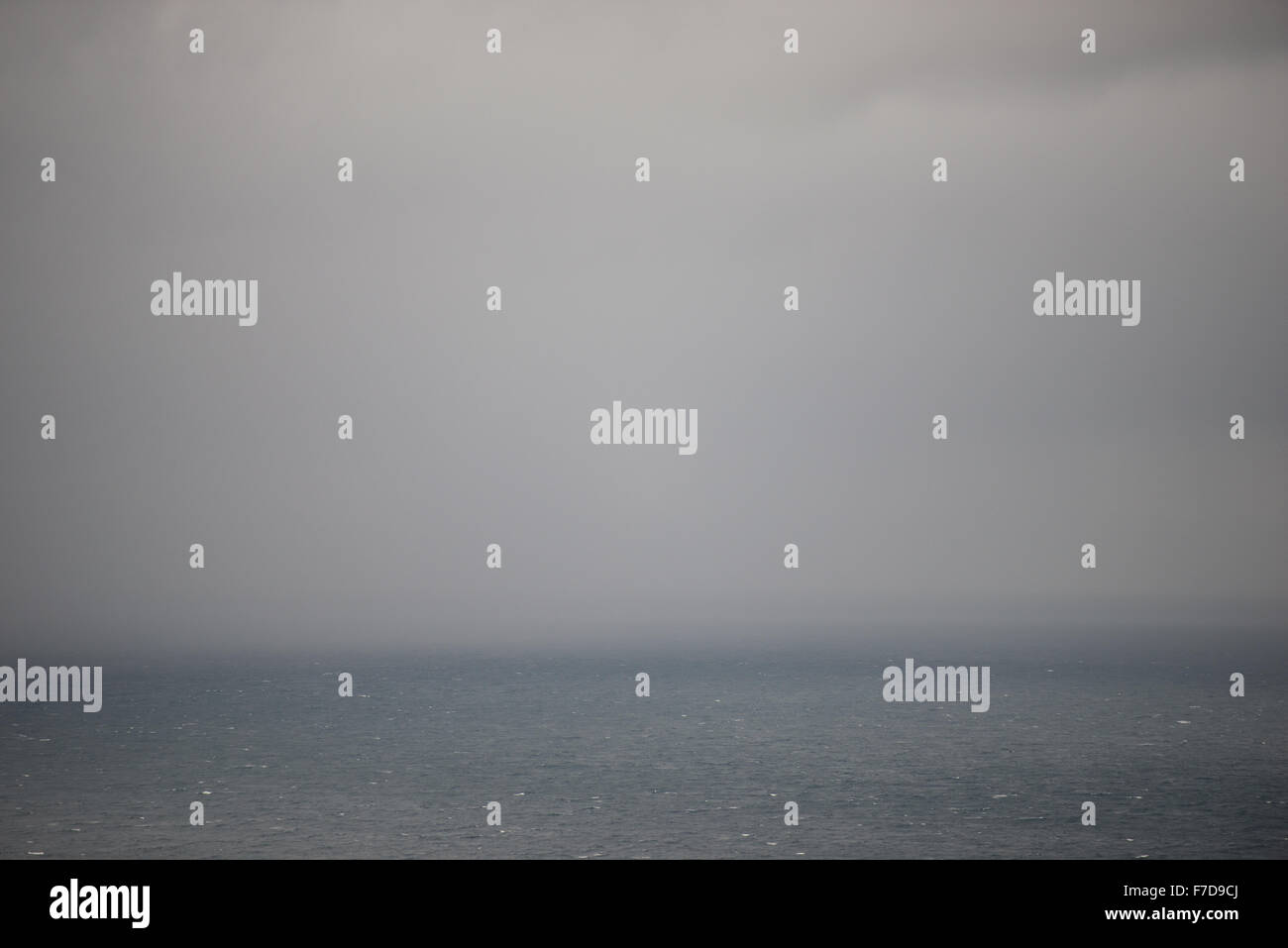 Ocean background with clouds and rain at the horizon Stock Photo - Alamy
