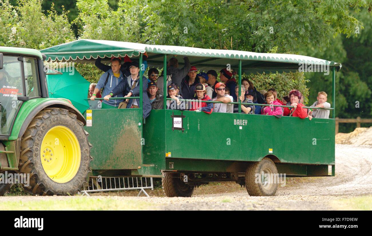 Fans arrive at the Silverstone F1 Grand Prix on the back of a tractor ...
