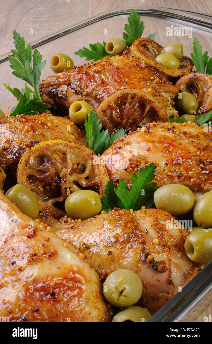 parts of chicken baked with olives marinated in lemon Stock Photo - Alamy