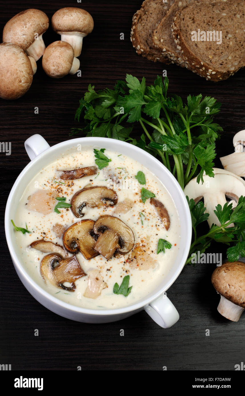 creamy soup pureed mushrooms and slices of chicken Stock Photo - Alamy