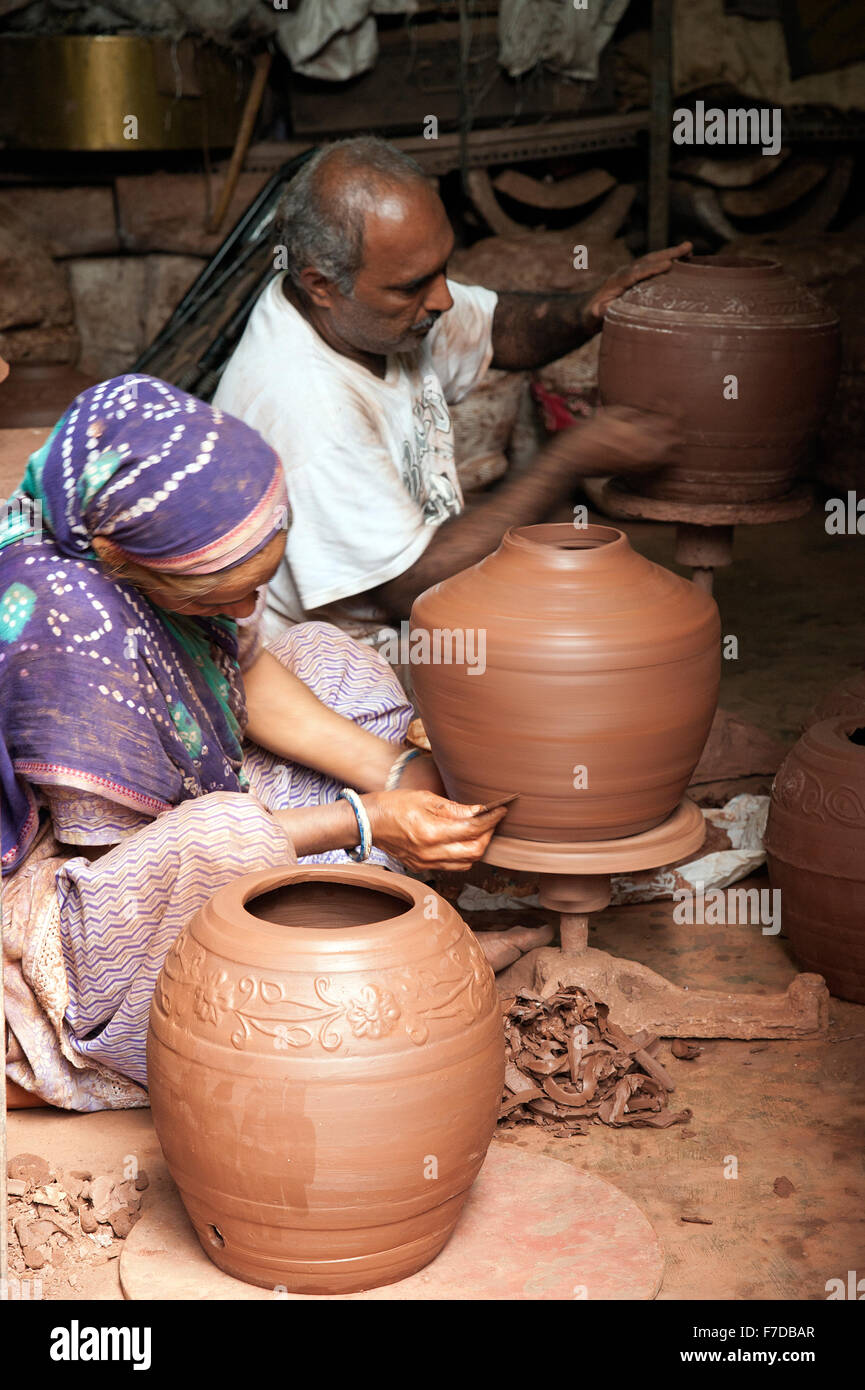 The image of Potter was taken in Dharavi, Mumbai Stock Photo - Alamy