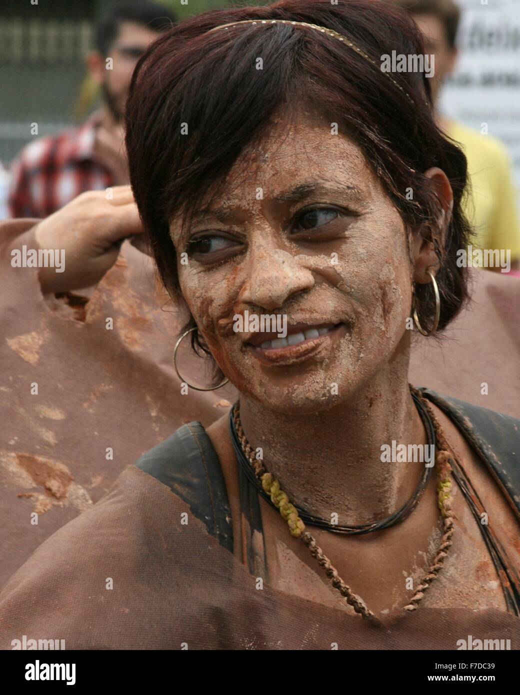 Rio de Janeiro, Brazil, 29th November, 2015. Protesters covered in mud ...