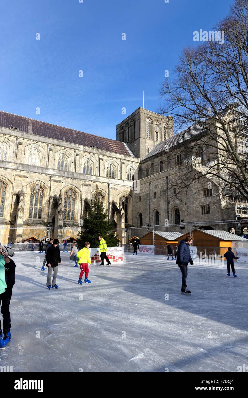 Ice skating rink in the grounds of Winchester cathedral Hampshire UK ...