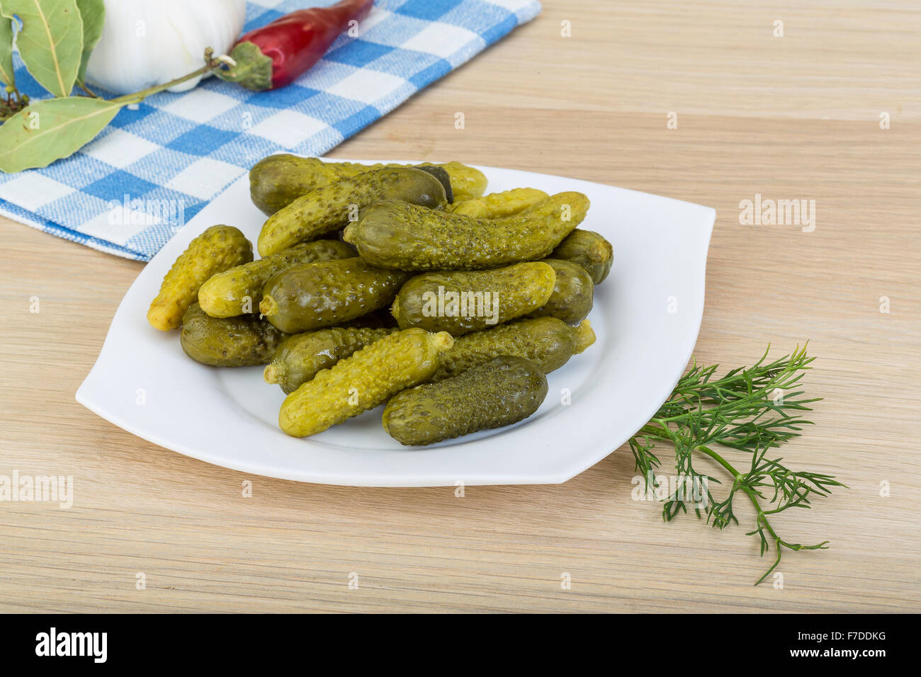 Pickled small cucumber with dill and spices Stock Photo - Alamy