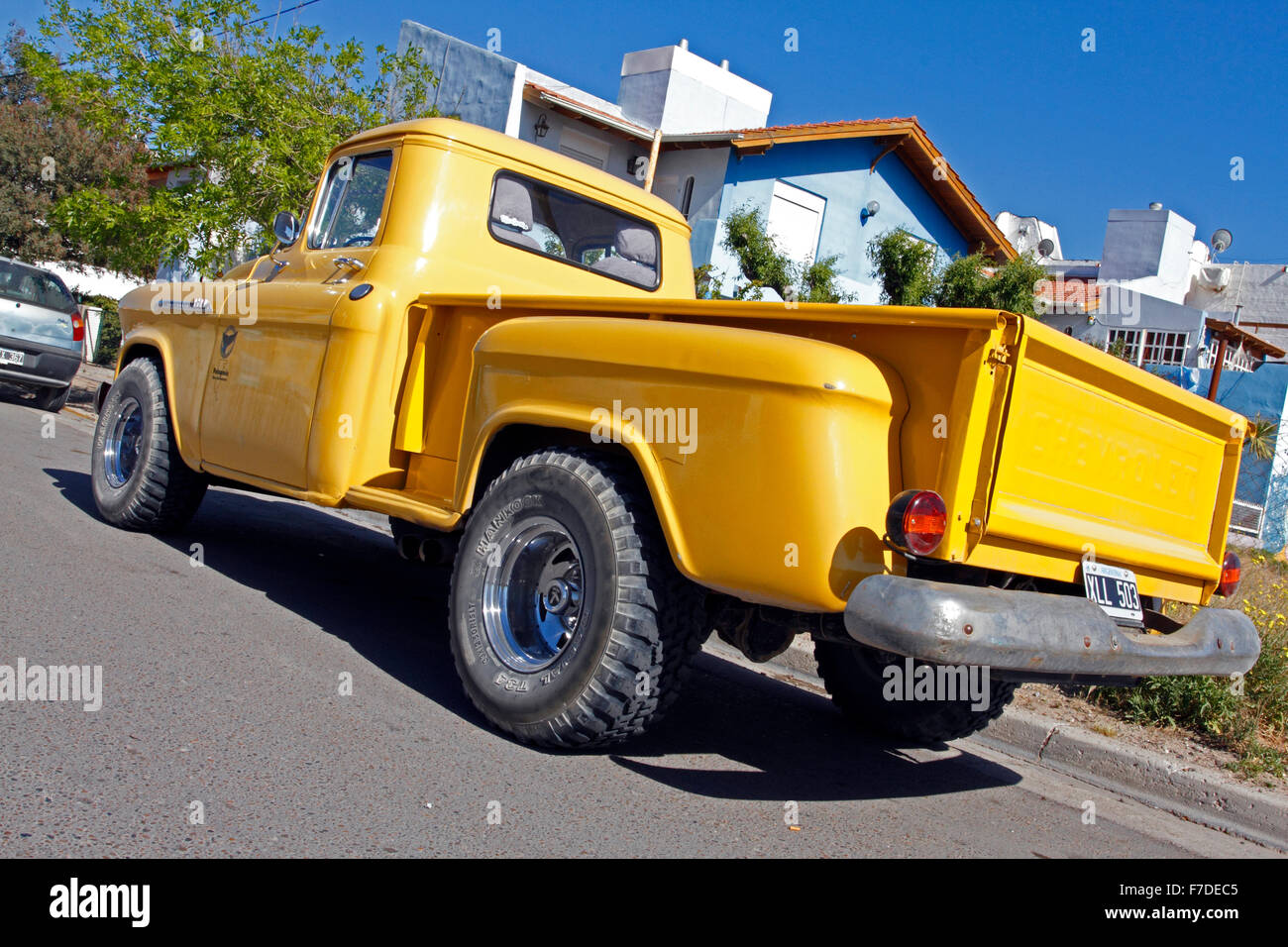 Old Yellow Chevrolet pick up parked in the street Stock Photo - Alamy