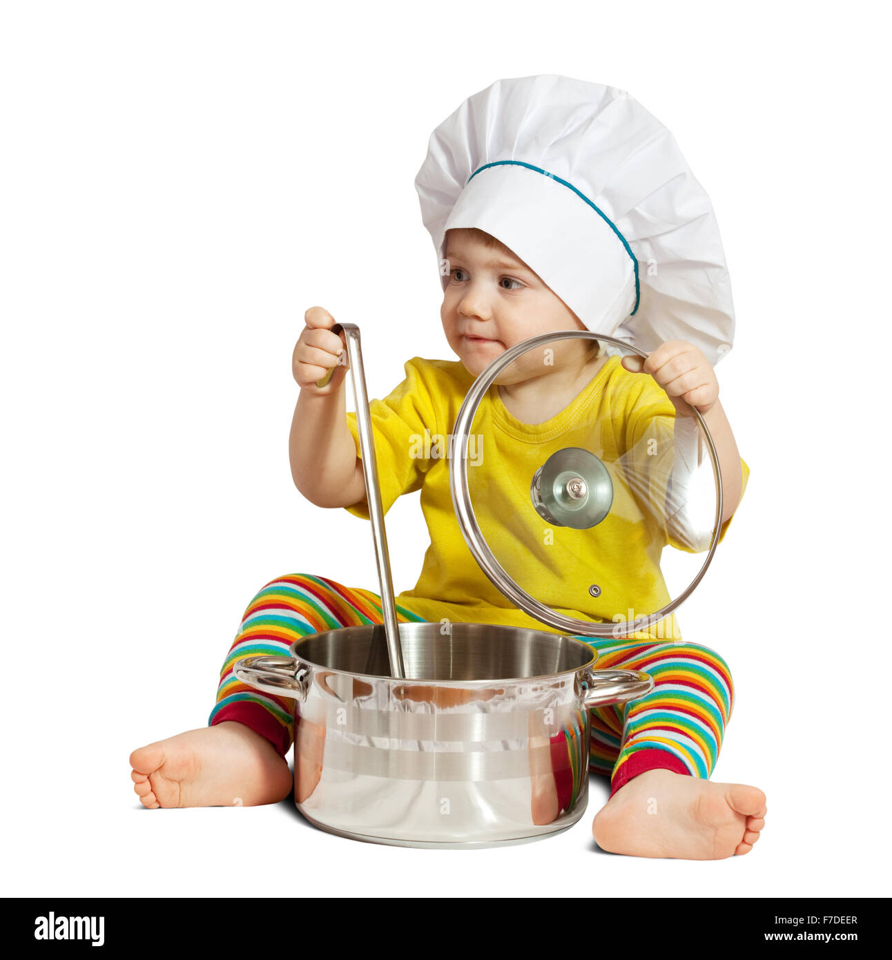 Baby cook in toque with pan. Isolated over white background with shade ...