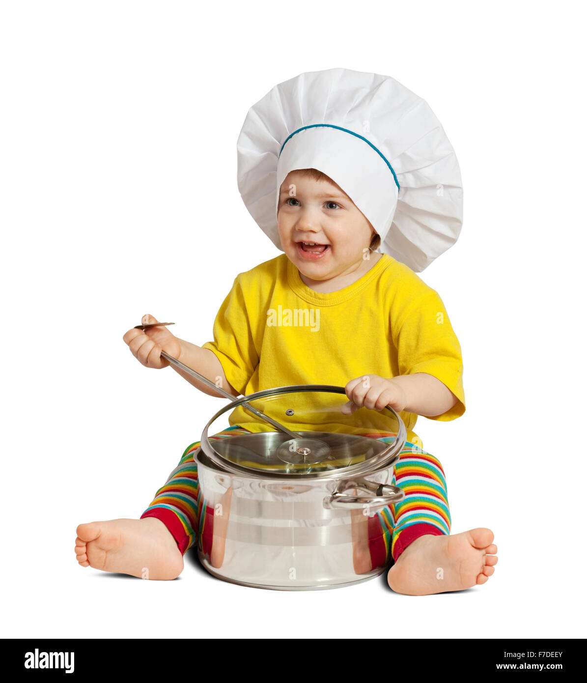 Baby cook in toque with pan. Isolated over white background with shade ...