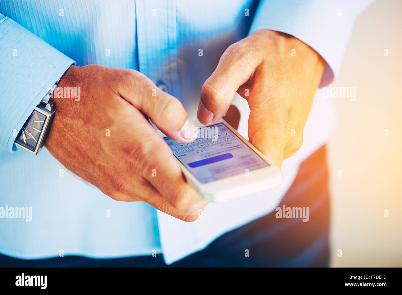 Close up of Young Man Using Mobile Smart Phone Stock Photo - Alamy